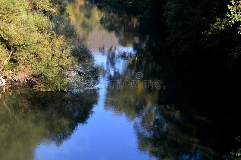River and reflection stock photo. Image of grass, reflection - 127916848