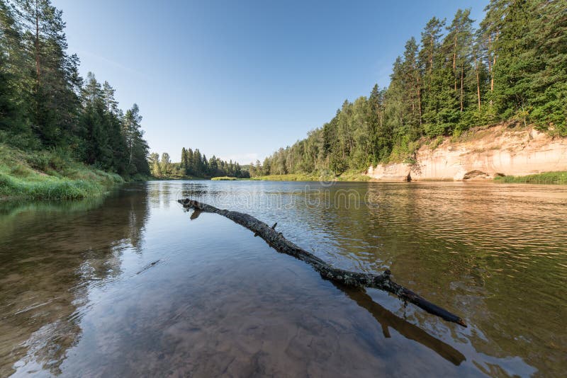 River with Reflections in Water and Sandstone Cliffs Stock Photo ...