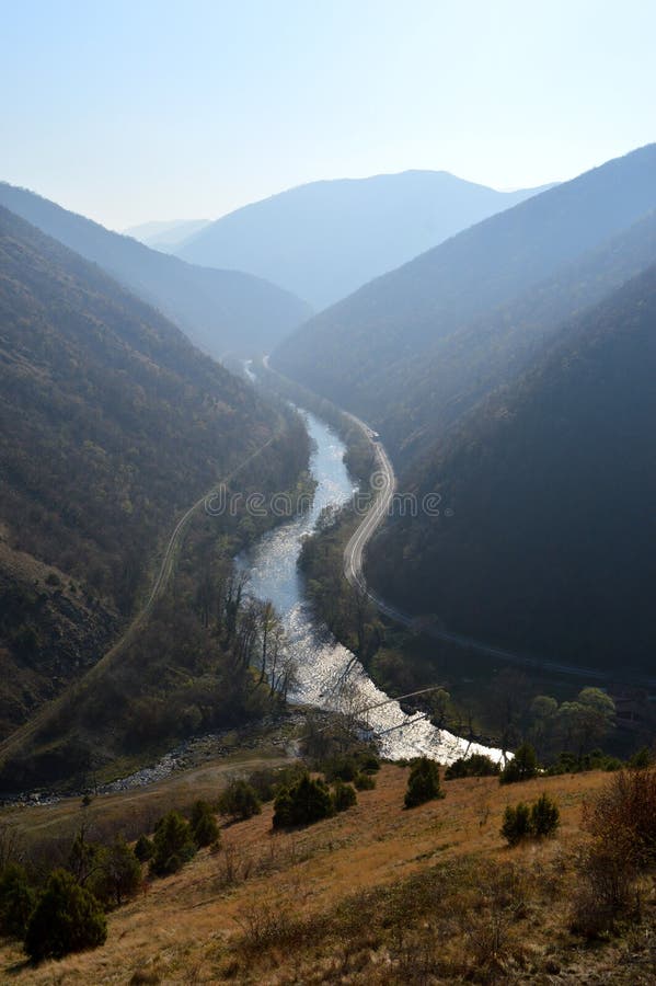 River, Road and Trail into the Valley Stock Image - Image of plant ...