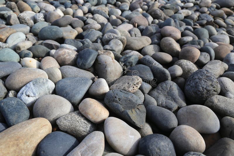 River rock background stock photo. Image of gravel, brown - 38552214