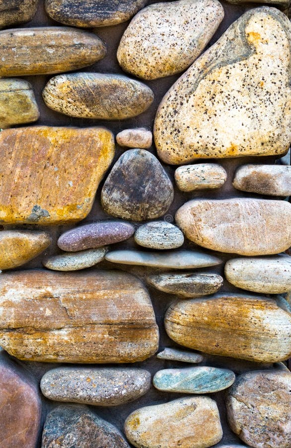 River Rock Wall Vertical stock image. Image of cement - 47025197