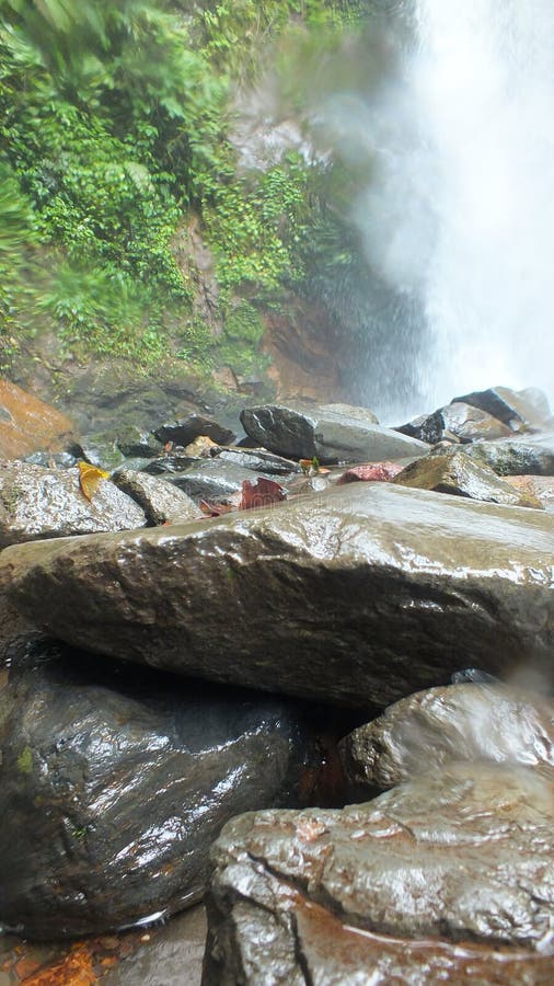 River Rock with Waterfall Background Stock Photo - Image of bubble ...