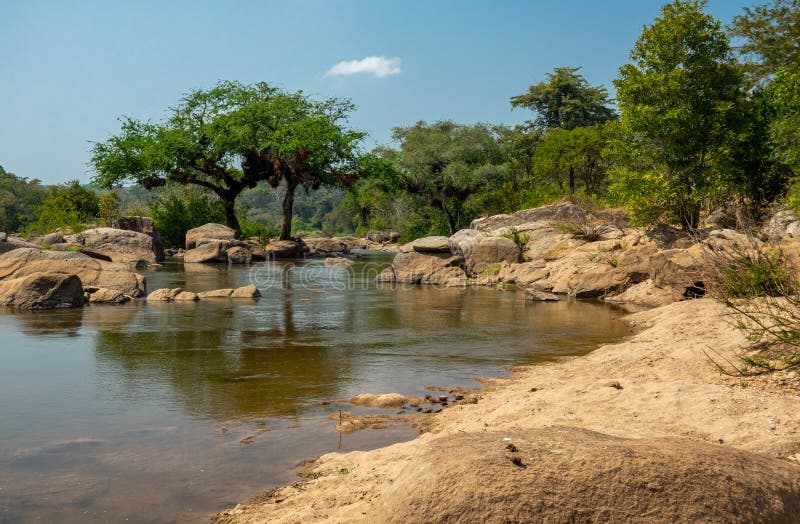 River with Rocks and Trees Under Blue Sky Stock Image - Image of quiet ...