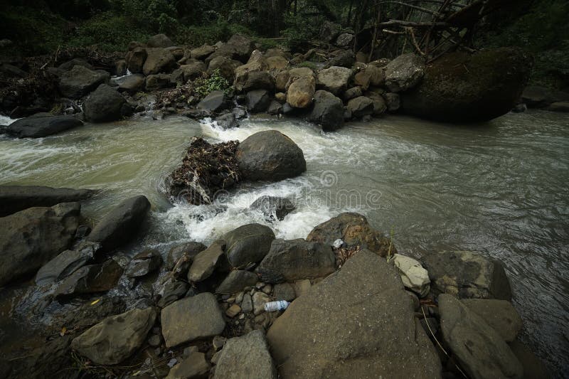 The River is Rocky and the Water is Murky Stock Photo - Image of ...