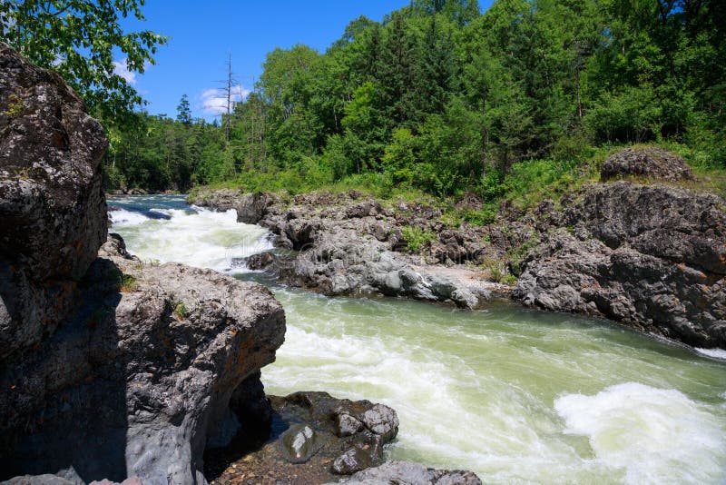 River with a rough stream stock photo. Image of season - 33930646