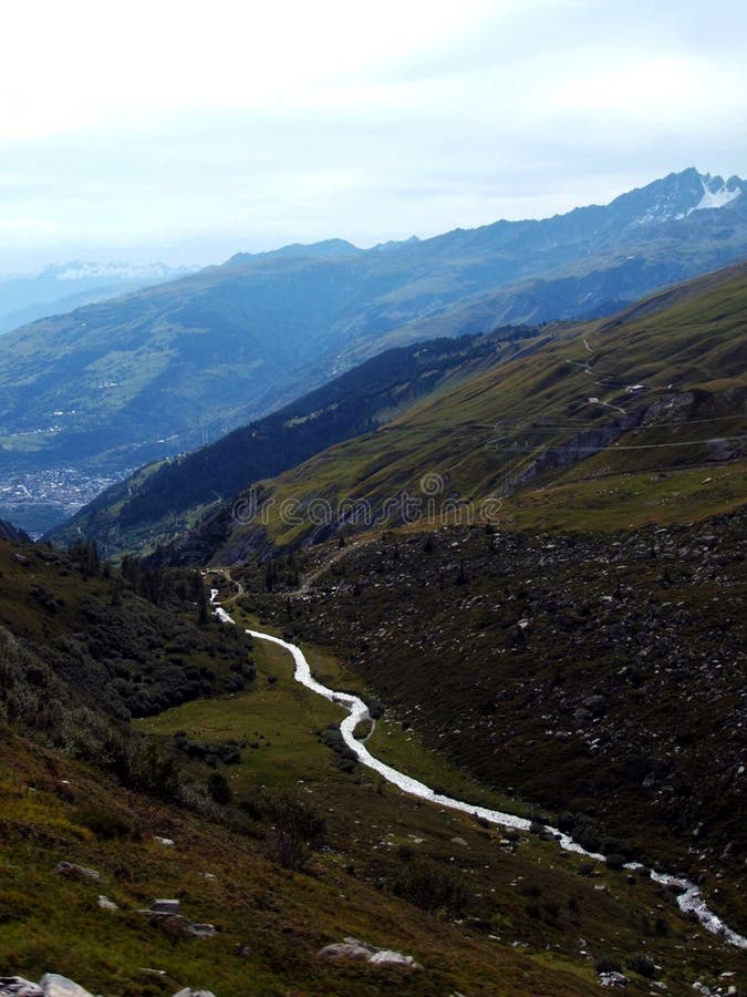 River Running through the Alps Stock Photo - Image of alps, valley ...