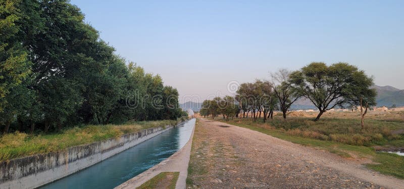 River Running through a Lush, Rural Landscape Stock Photo - Image of ...