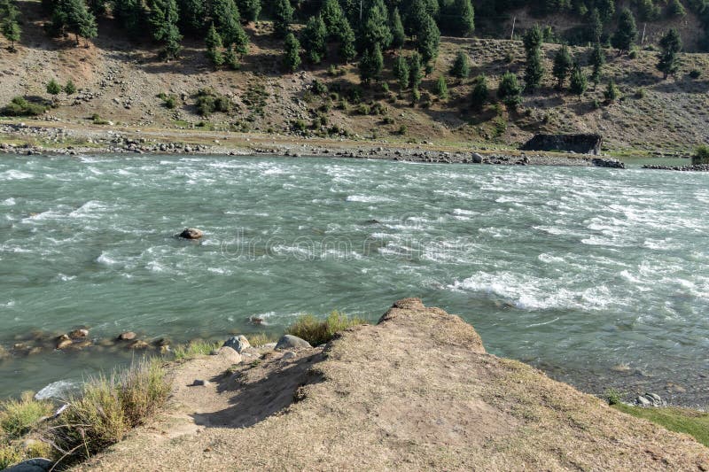 A River Runs through the Two Land Masses and Tree Line on the Side ...