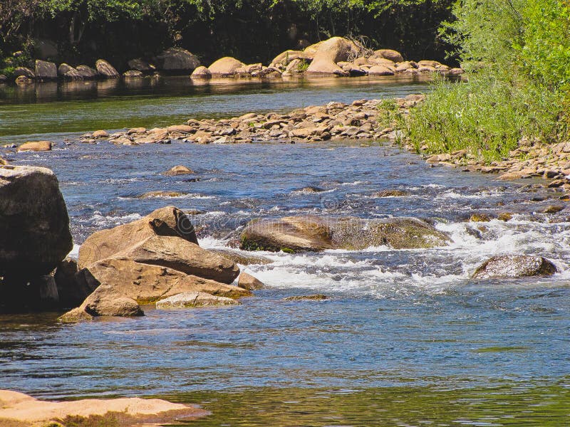 River Rushing Over Shallow Bed and Large Rocks Stock Image - Image of ...