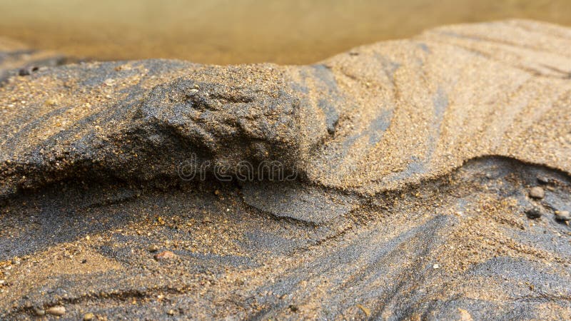 River Sand Texture with a Mixture of Iron Ore and Pebbles Stock Photo ...