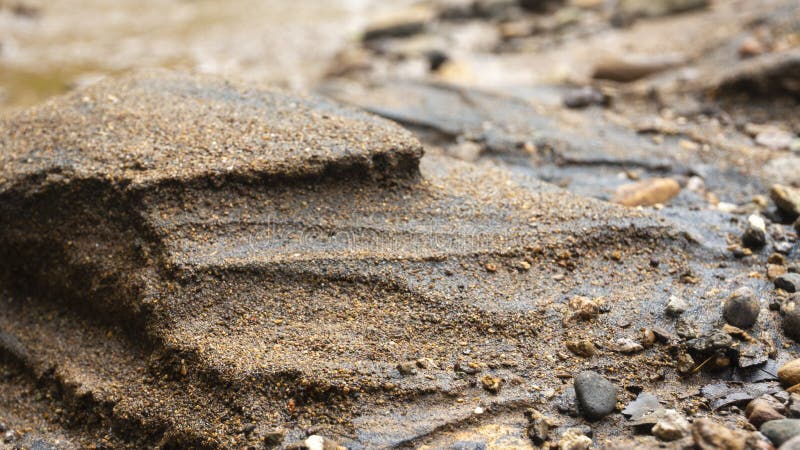 River Sand Texture with a Mixture of Iron Ore and Pebbles Stock Photo ...