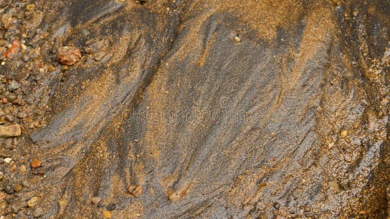 River Sand Texture with a Mixture of Iron Ore and Pebbles Stock Image ...