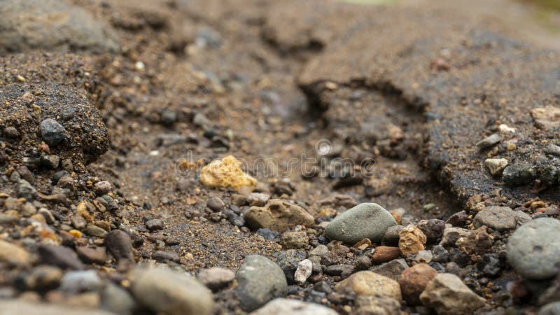 River Sand Texture with a Mixture of Iron Ore and Pebbles Stock Image ...