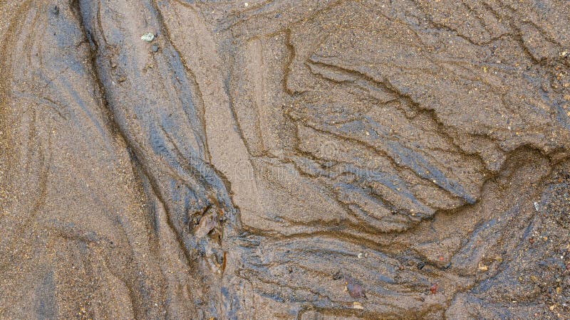 River Sand Texture with a Mixture of Iron Ore and Pebbles Stock Image ...