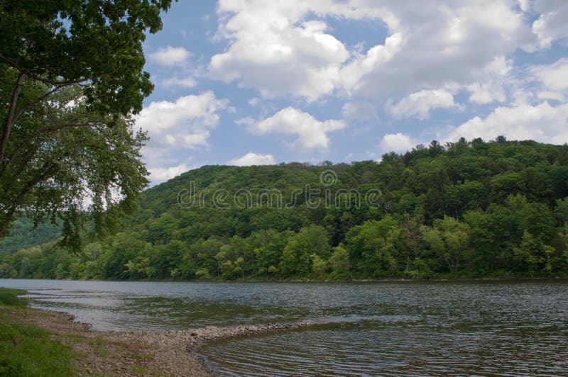 A River Scene Under Pretty Skies Stock Image - Image of relaxation ...