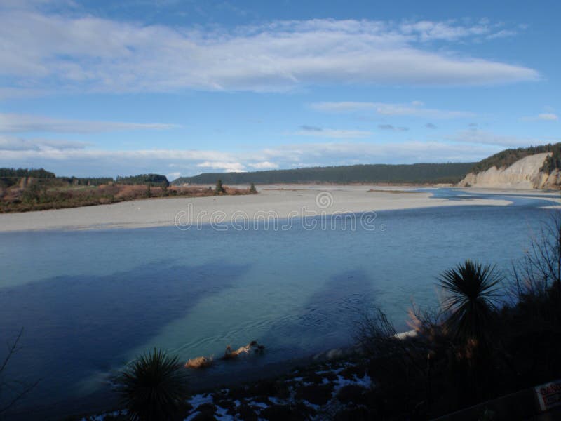 River stock photo. Image of trees, shadows, river, mountains - 265282672