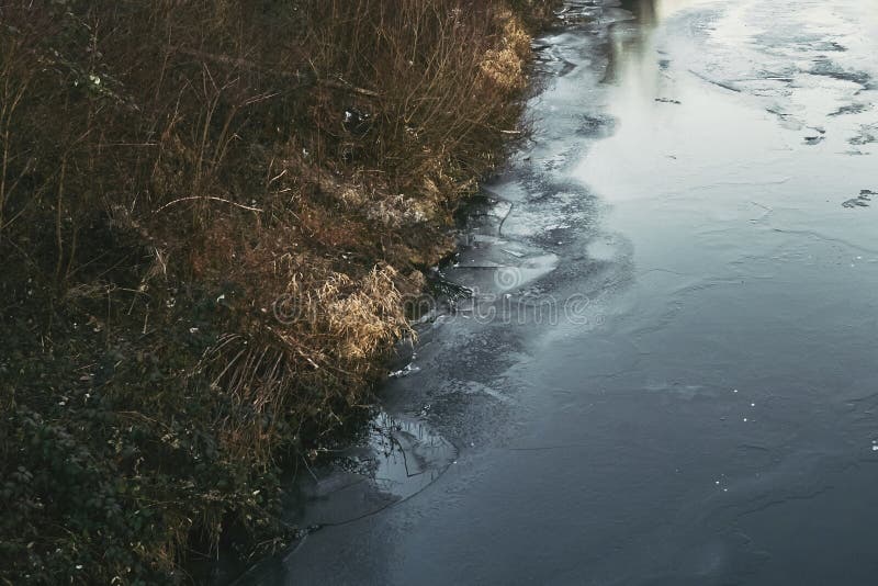 River Side on a Cold Day with Reflection Stock Photo - Image of flow ...