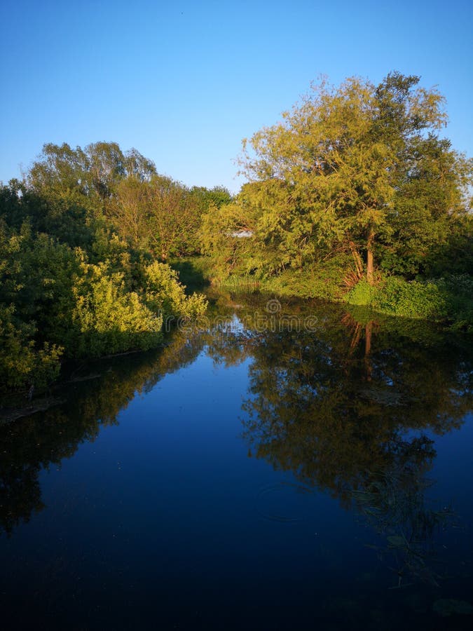 River side reflection stock photo. Image of side, water - 202892112