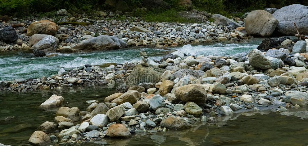 River side rocks stock photo. Image of hilly, serene - 255402296