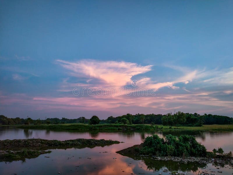 River Side View of Tress and Dramatic Sky Stock Image - Image of ...