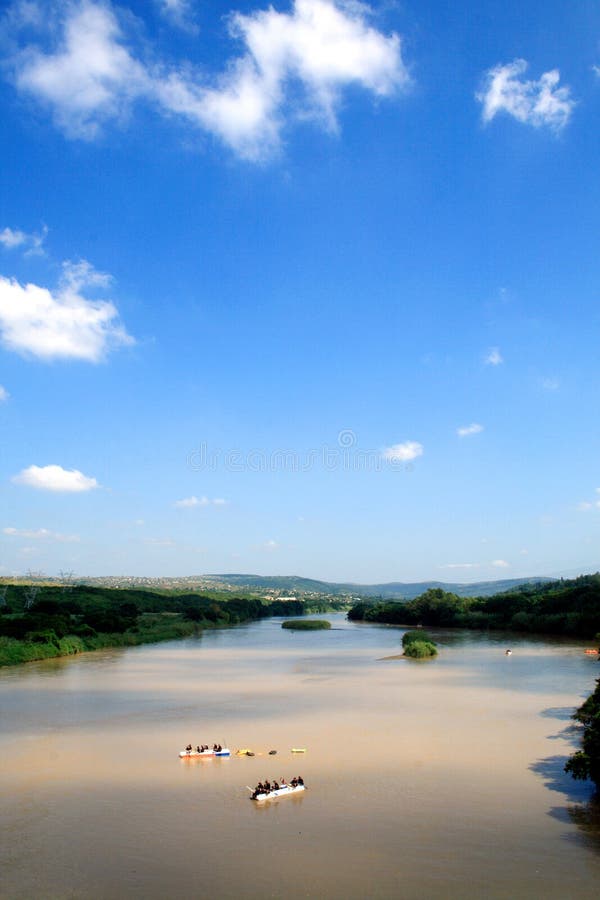 River and sky stock image. Image of boat, blue, land, bright - 4817633