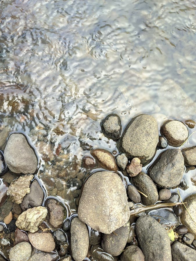 River Stone that Has a Bright Color and Rough Texture Stock Image ...