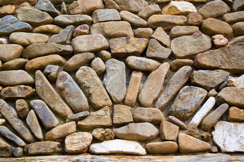 River stone wall stock photo. Image of texture, wall - 130665536