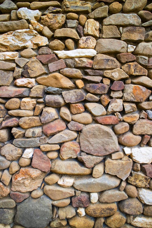 River stone wall stock image. Image of shape, background - 130666125