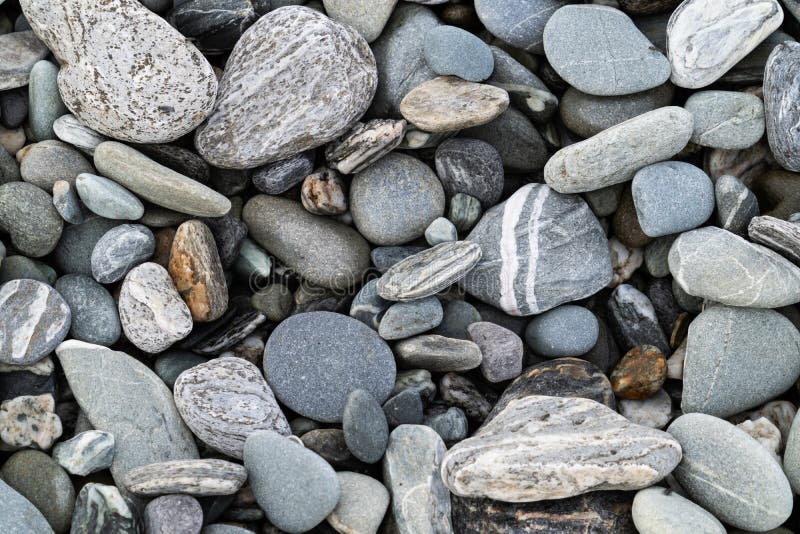River Stones in Typical Random Pattern and Type Stock Image - Image of ...