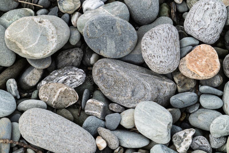 River Stones in Typical Random Pattern and Type Stock Photo - Image of ...