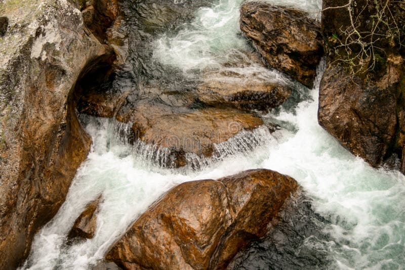 River Stream Passing between the Rocks Stock Image - Image of branches ...