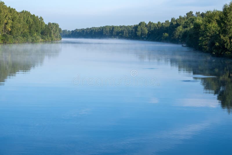 River Stretching into the Distance among the Trees Stock Photo - Image ...