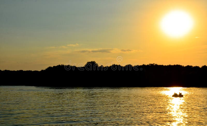 River Summer Sunset Yellow Sun Beam Boat on the River Stock Image ...