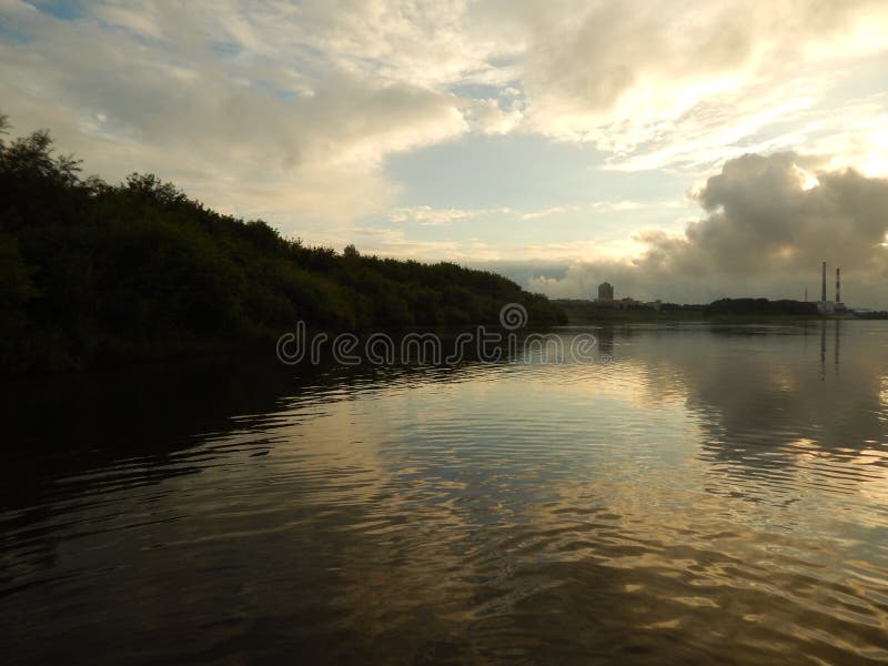 River at Sunset, the Confluence of Clouds and Water Stock Photo - Image ...