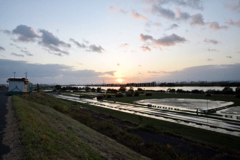 River and the Sunset after the Typhoon. Stock Photo - Image of ...