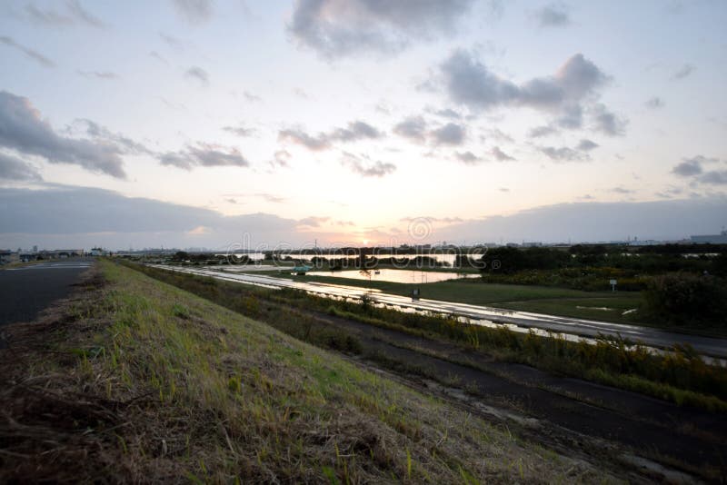 River and the Sunset after the Typhoon. Stock Image - Image of dirty ...