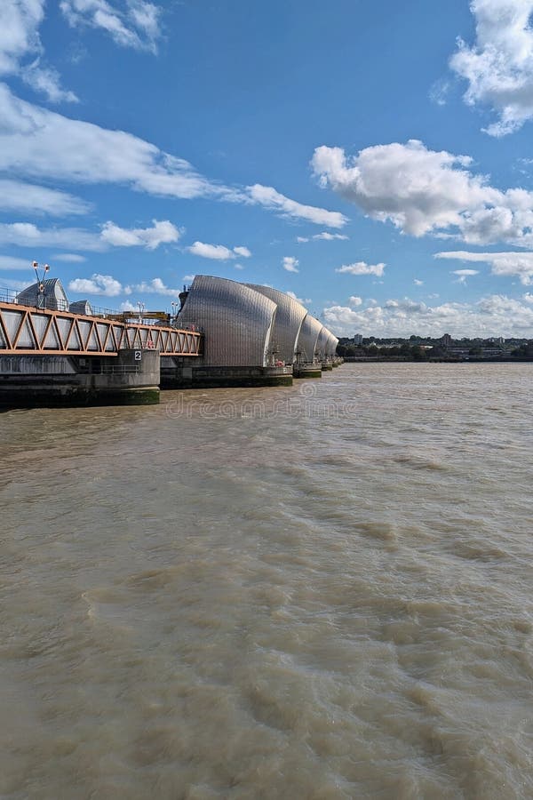 River Thames and the Thames Barriers in London Against a Blue Sky ...