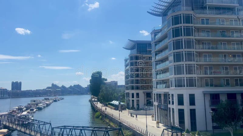 The River Thames Flows through Central London, with Modern Buildings ...