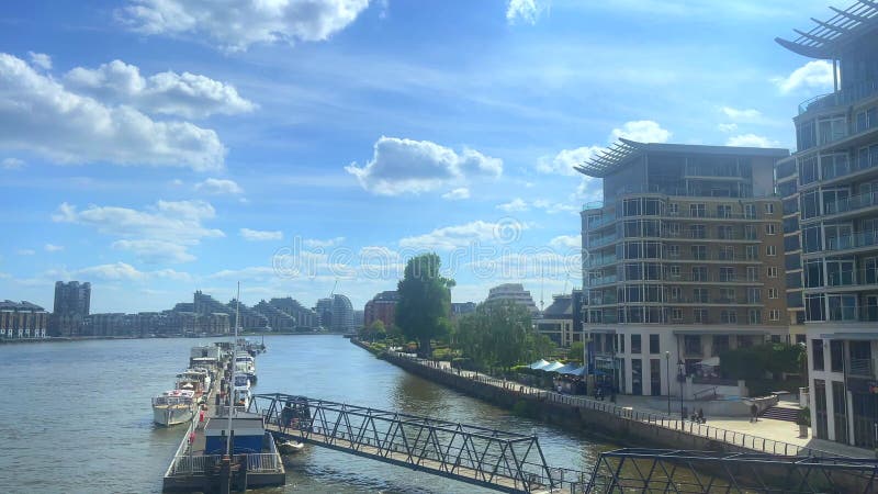 The River Thames Flows through Central London, with Modern Buildings ...