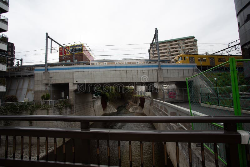 River Under a Railway Bridge in a City Editorial Photo - Image of ...