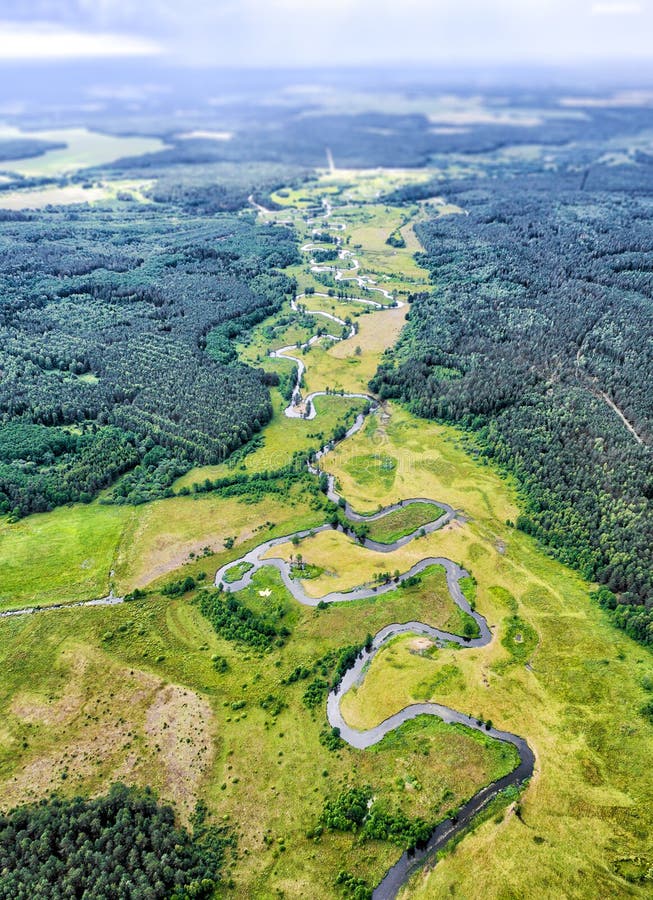 Top View of the Valley of a Meandering River among Green Fields Stock ...