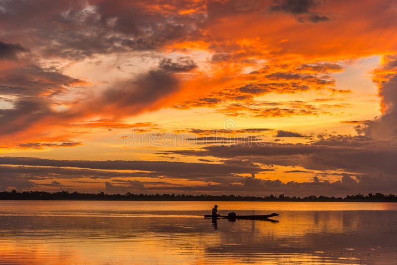 River View of Sunset with Fisherman Stock Image - Image of horizon ...