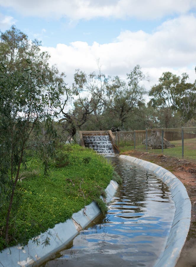 River Water Cascading into Concrete Channel. Stock Image - Image of ...