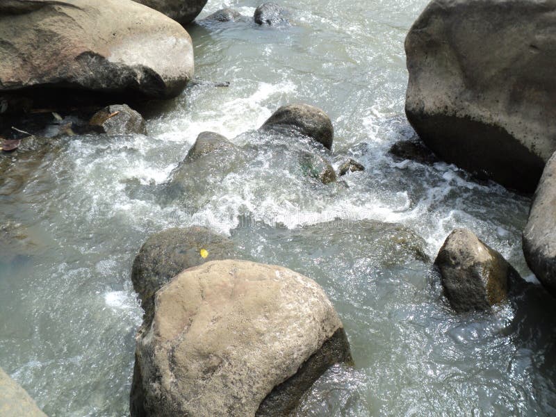 River water flow and rocks stock photo. Image of river - 151847148