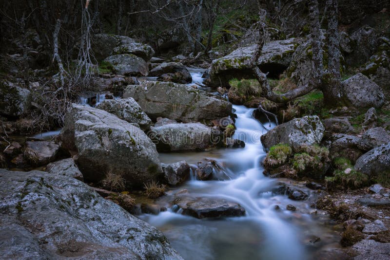 River Water Flows among the Rocks and Forms Small Waterfalls, RascafrÃ ...