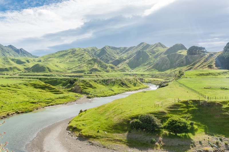 River winds through fields stock photo. Image of scenery - 74082376