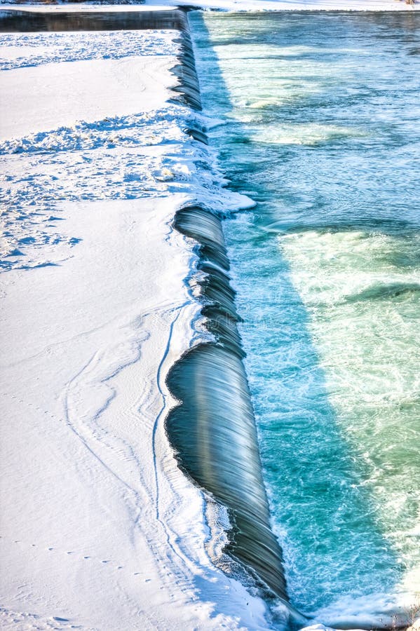 River in Winter Pouring Over the Dam Stock Photo - Image of season ...