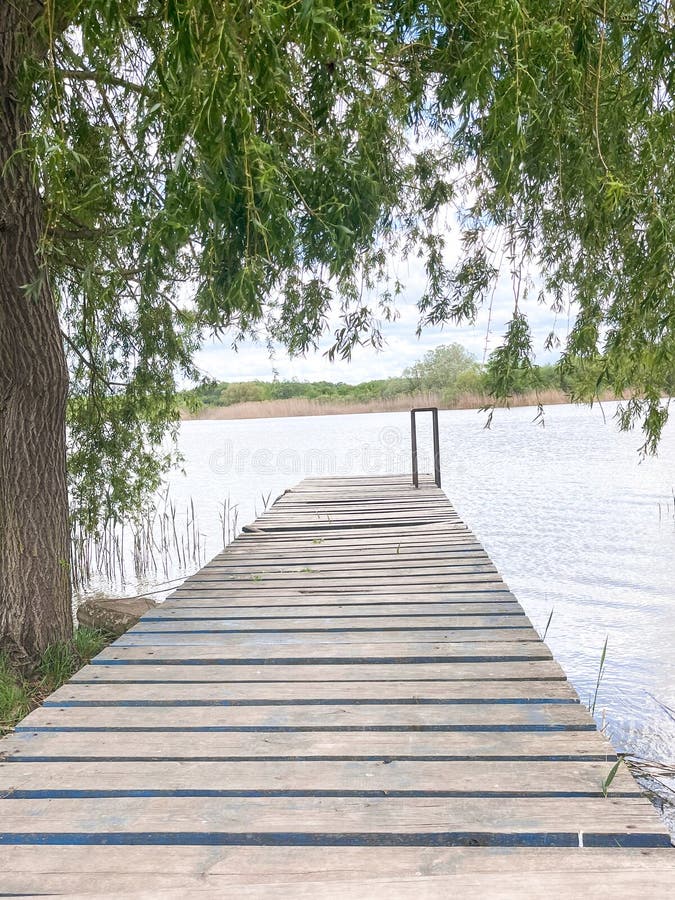 River Wooden Pier. View of the River from a Wooden Pier Stock Image ...