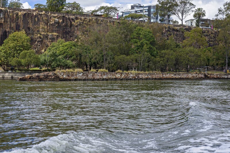A Riverside Boardwalk Walking Track Protected by Laid Stone in Front of ...