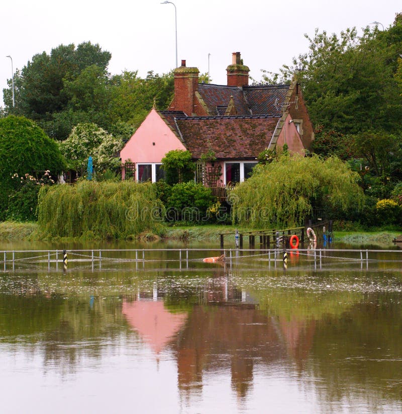 Riverside Cottage at High Tide. Stock Image - Image of cottage, coastal ...